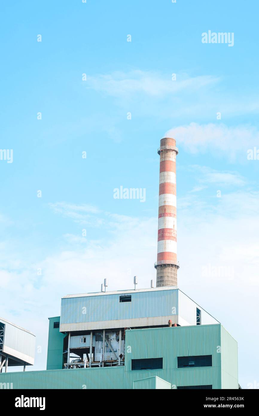 A tall, vertical metal structure stands on the side of a large ...