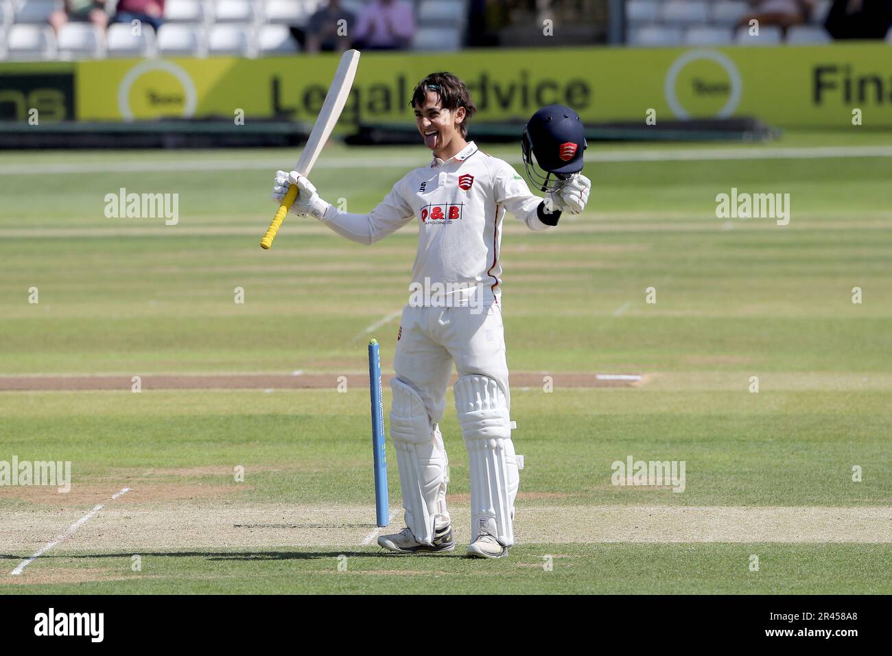 Robin Das of Essex raises his bat after reaching his century during ...