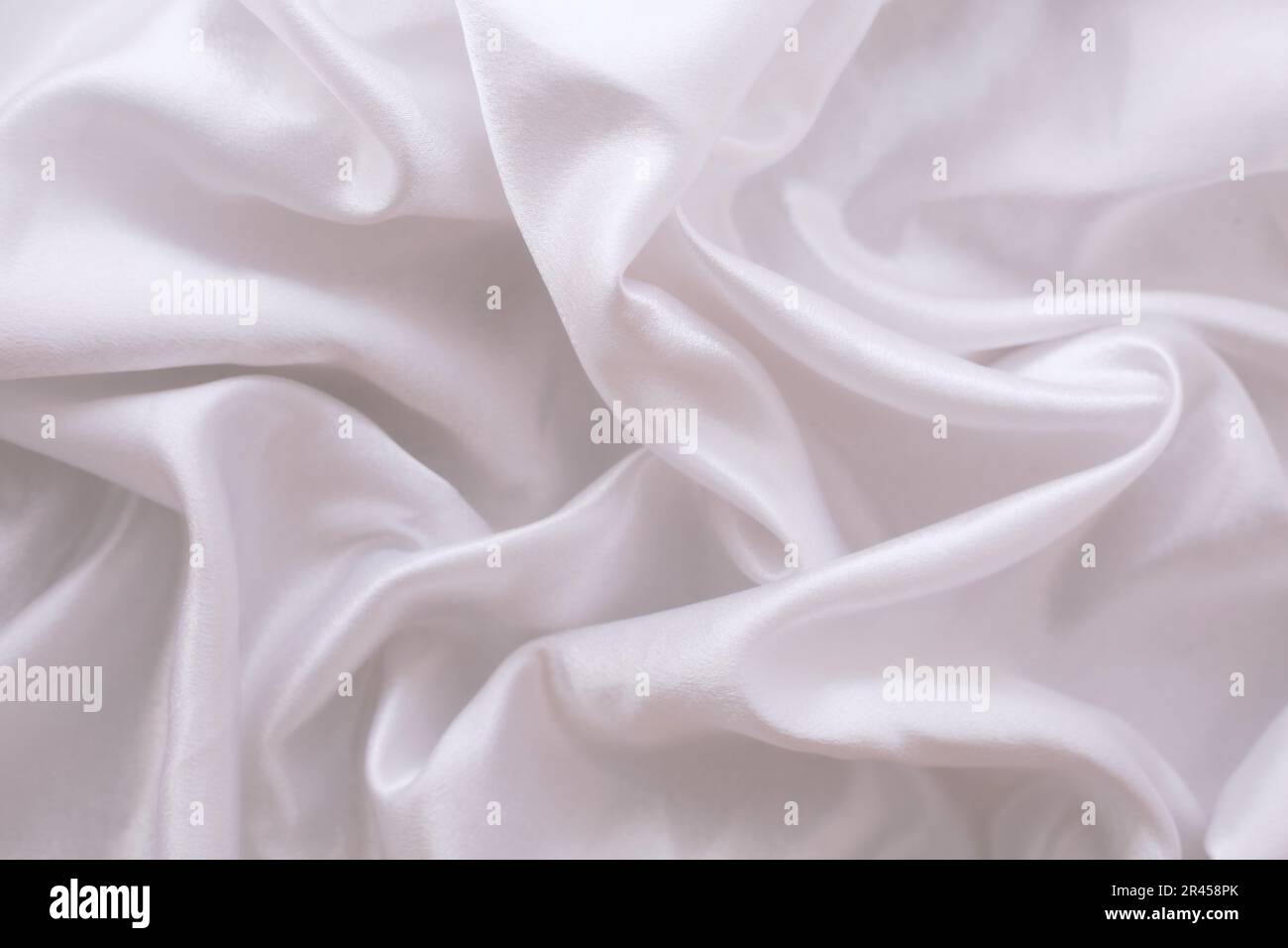 Smooth elegant white silk or satin luxury cloth texture can use as ...