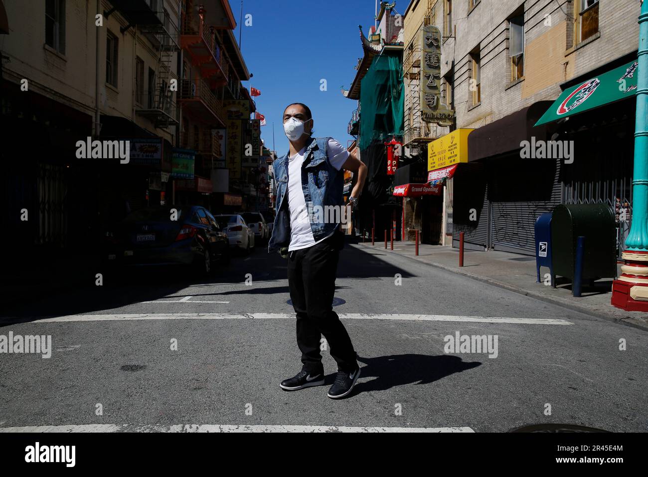 Max Leung, founder of SF Peace Collective, looks down Grant Avenue ...