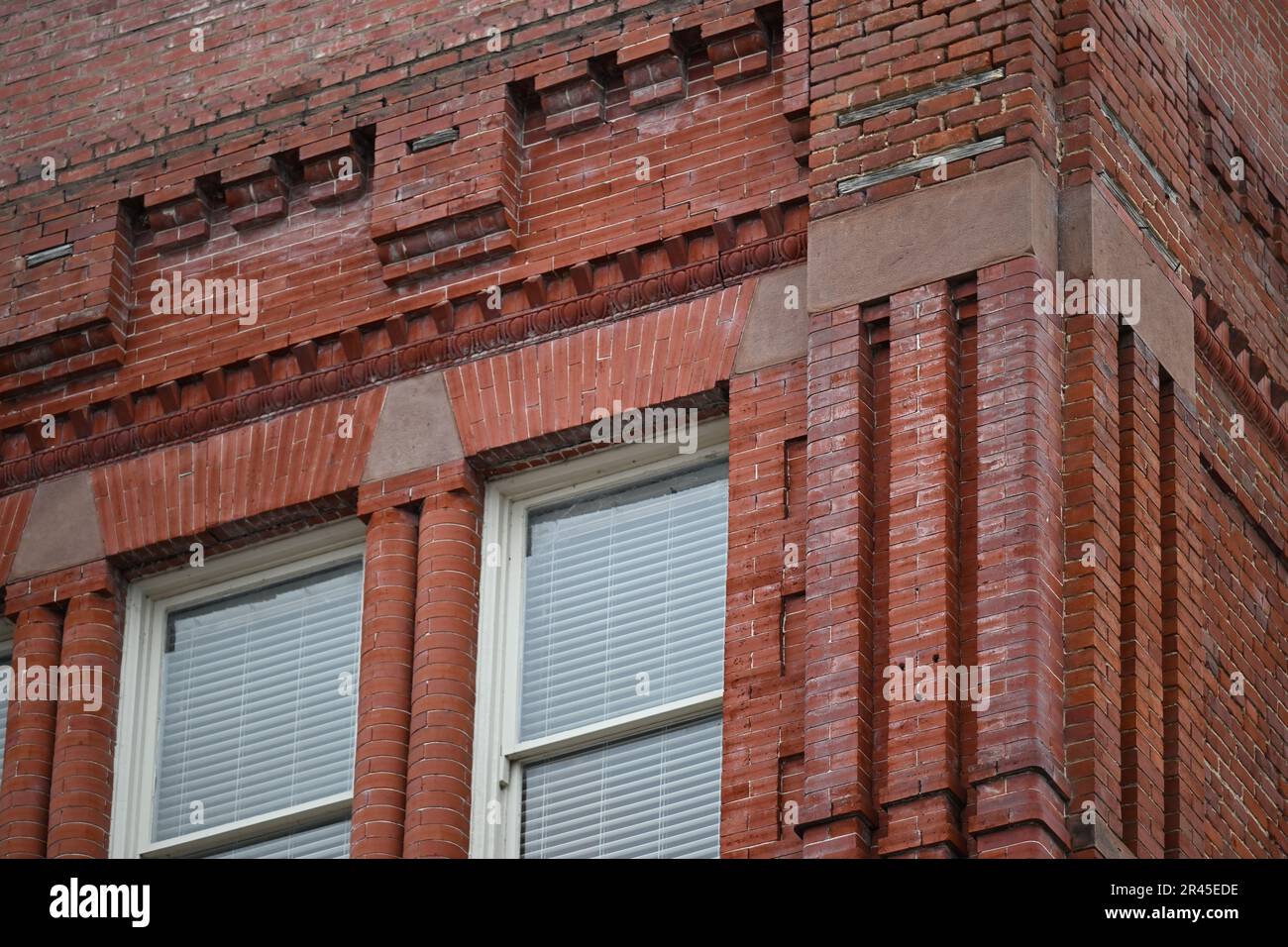 A traditional red brick building in the city Stock Photo - Alamy