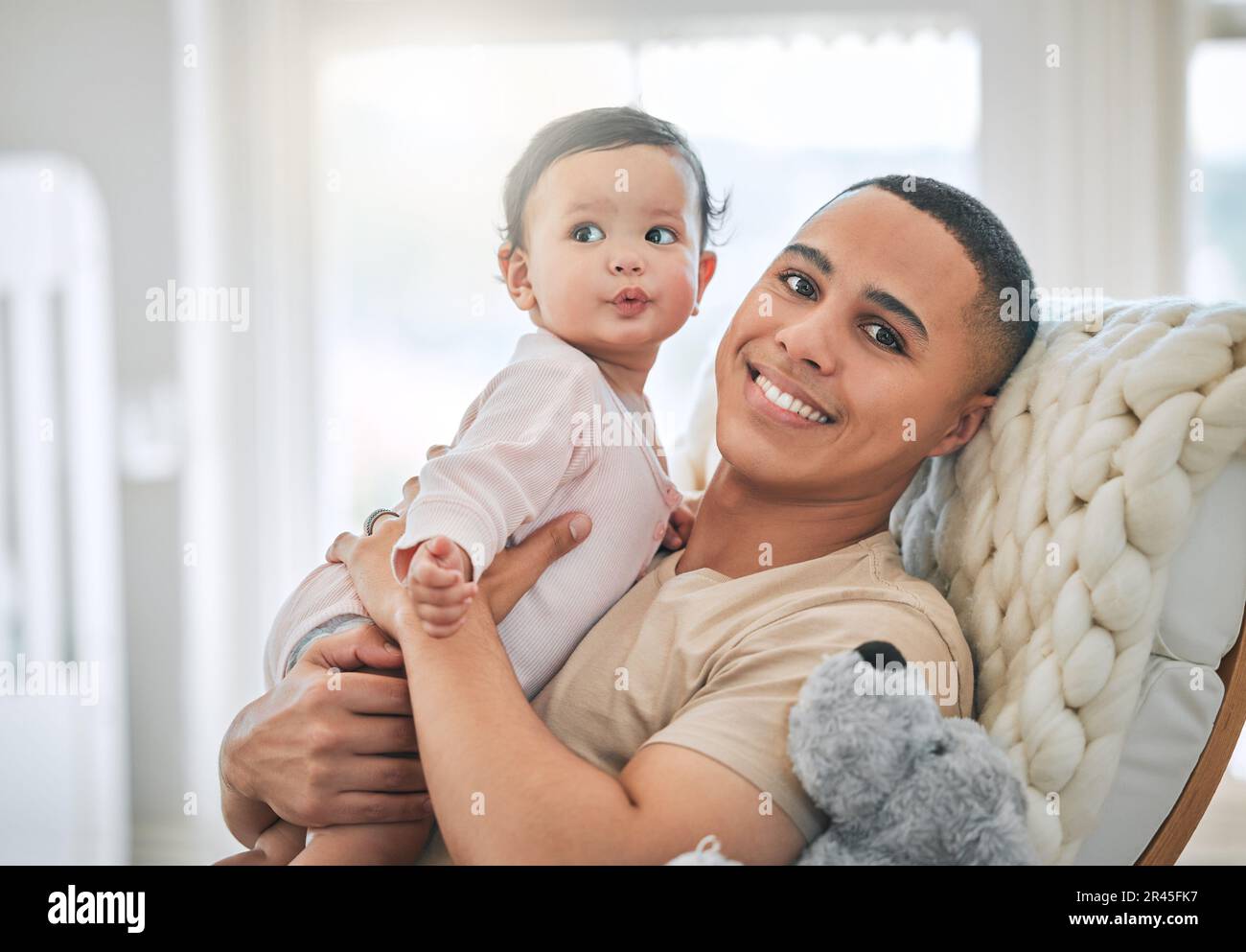 Father, holding baby and portrait in a family home for bonding ...