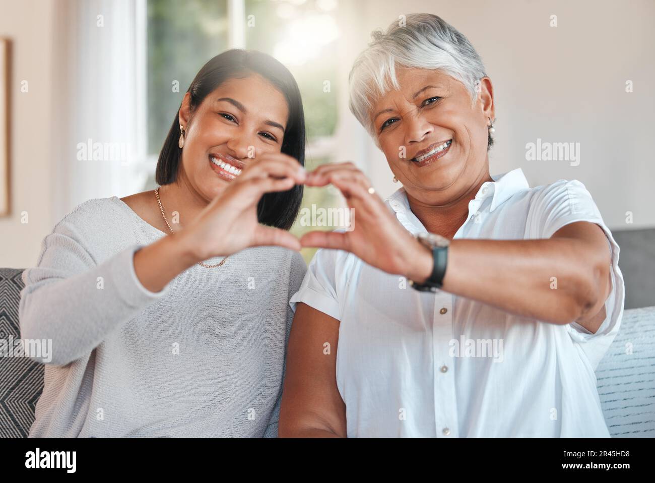 Heart hands, portrait and elderly mother and daughter with care ...