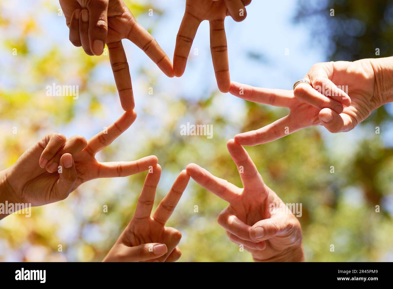 Fingers in star shape, group of people showing of diverse hands ...