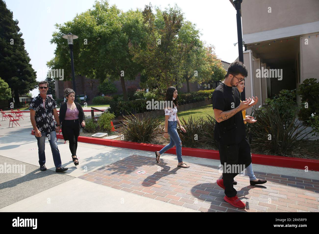 Jose Villalobos (l to r) holds his wife Maria Villalobos' hand as they ...