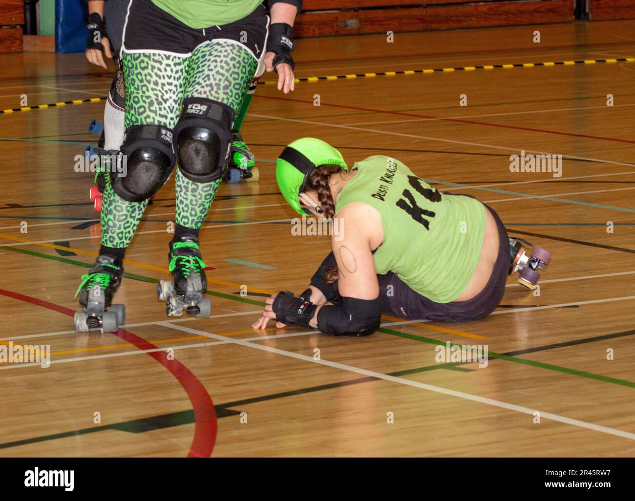 Downed roller derby skater during a bout at the Kelsey Kerridge sports ...