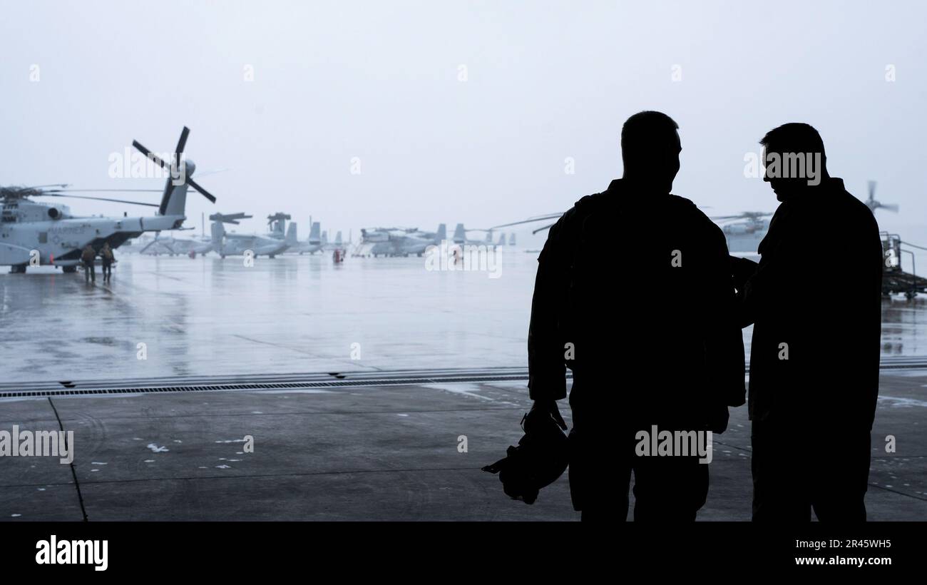 U.S. Marine Corps Maj. Nick McMurray, left, the camp-de-aide for the ...