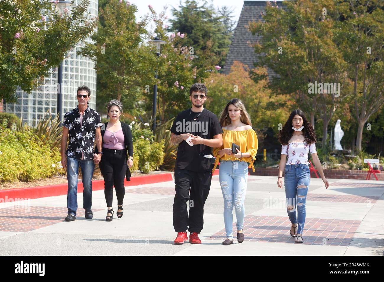 Jose Villalobos (l to r) holds his wife Maria Villalobos' hand as they ...