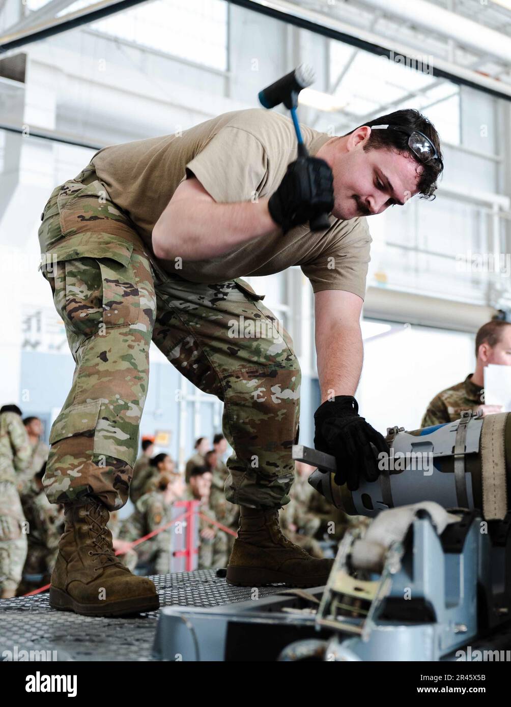 Senior Airman Johnson William, 2nd Munitions Squadron crew member ...