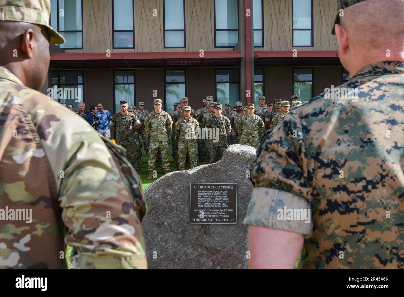 Members of the Defense POW/MIA Accounting Agency (DPAA) stand in formation during a remembrance ...