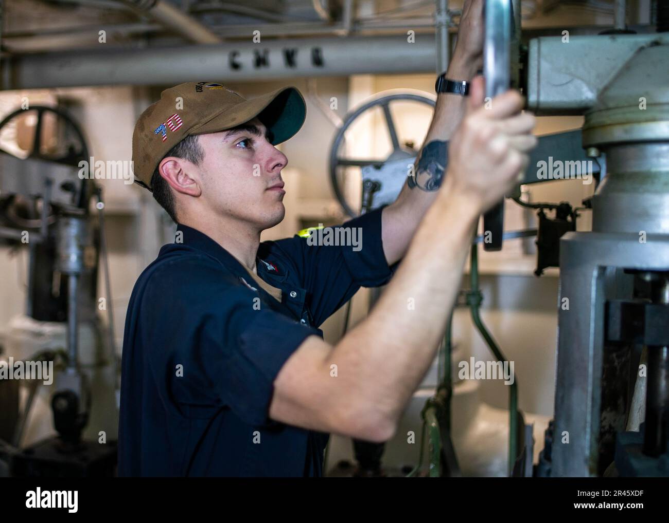 230327-N-AV223-1316 PACIFIC OCEAN (March 27, 2023) Machinist Mate 3rd ...