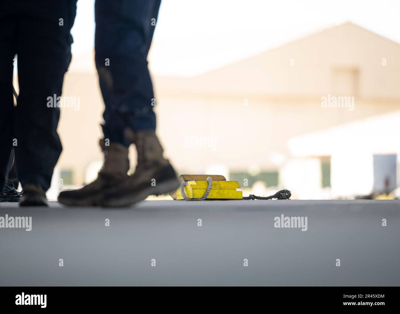 Chocks are removed from the tires of the U.S. Air Force F-16C Fighting ...