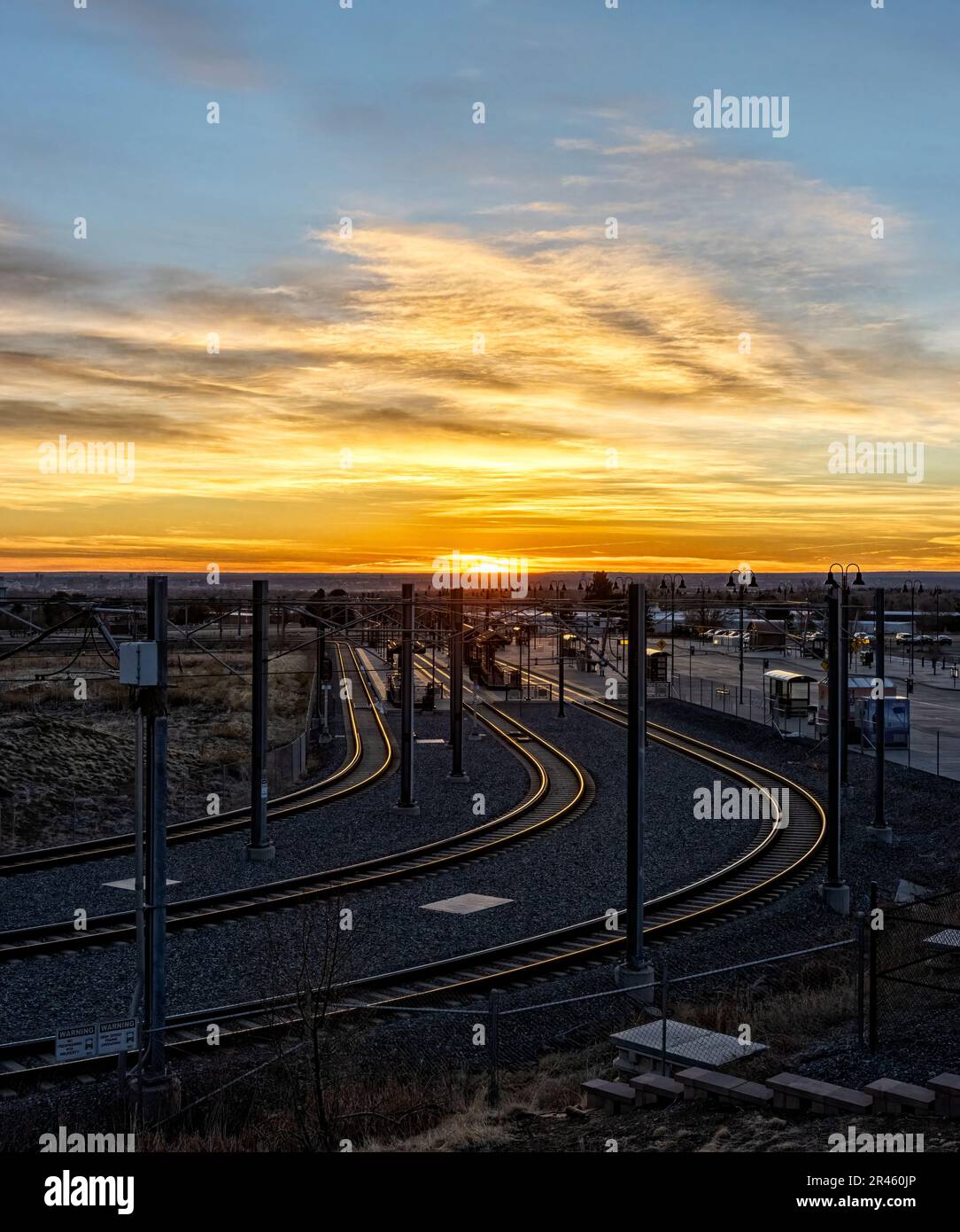 The triple train tracks leading to the sunrise Stock Photo - Alamy