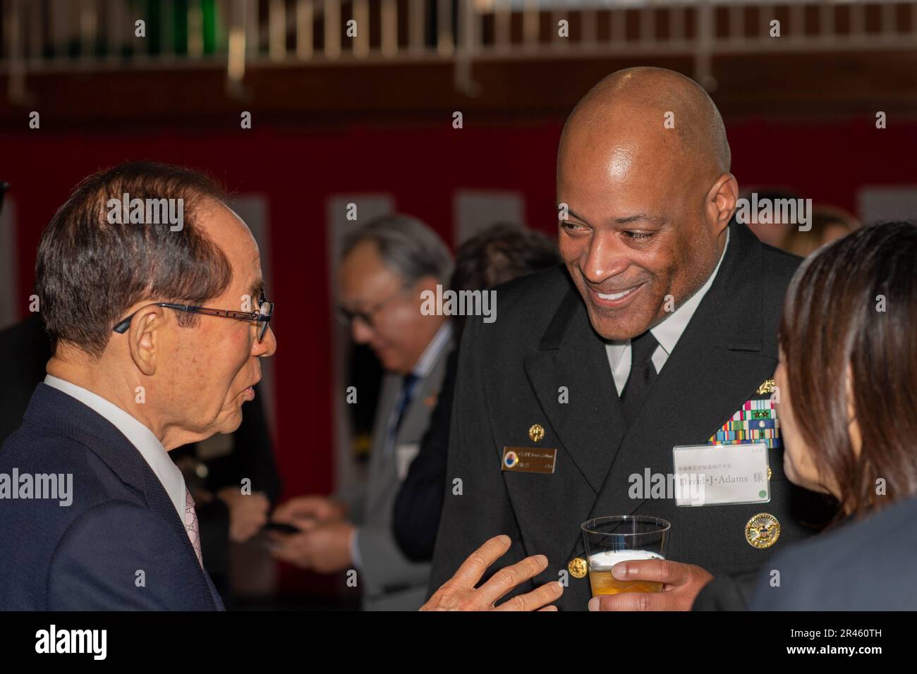 Capt. David Adams, Commander, Fleet Activities Sasebo (CFAS), speaks to ...