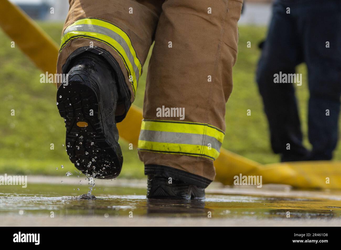 A firefighter with Camp Kinser Fire Station, Marine Corps Installations ...