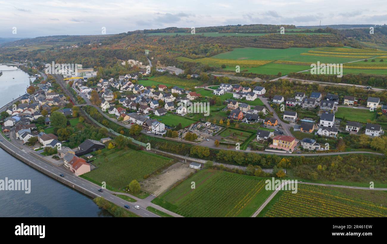 An aerial view of River Mosel surrounded by Wellen on a rainy day in ...