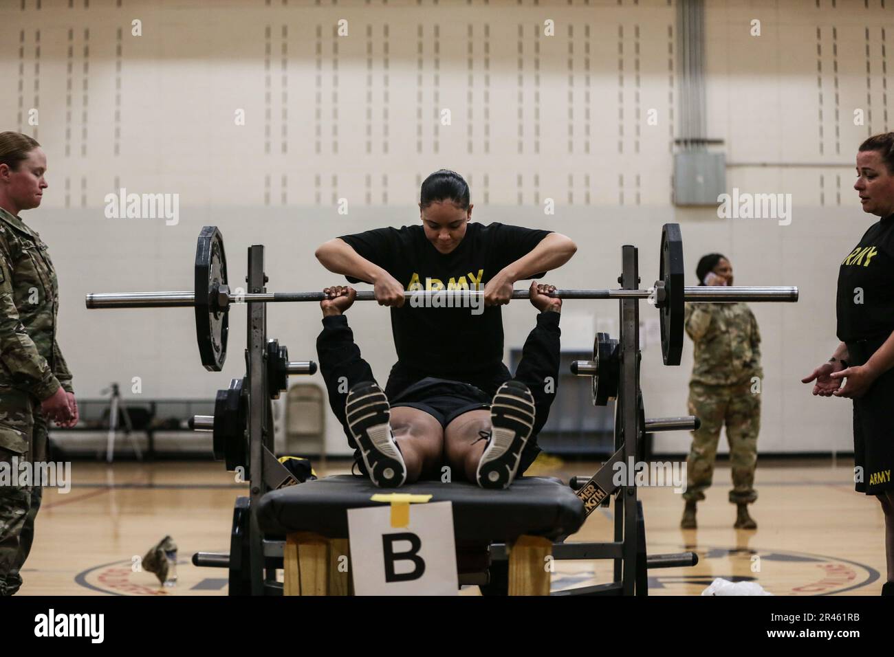 U.S. Army Athletes, practicing proper bench press technique during the ...