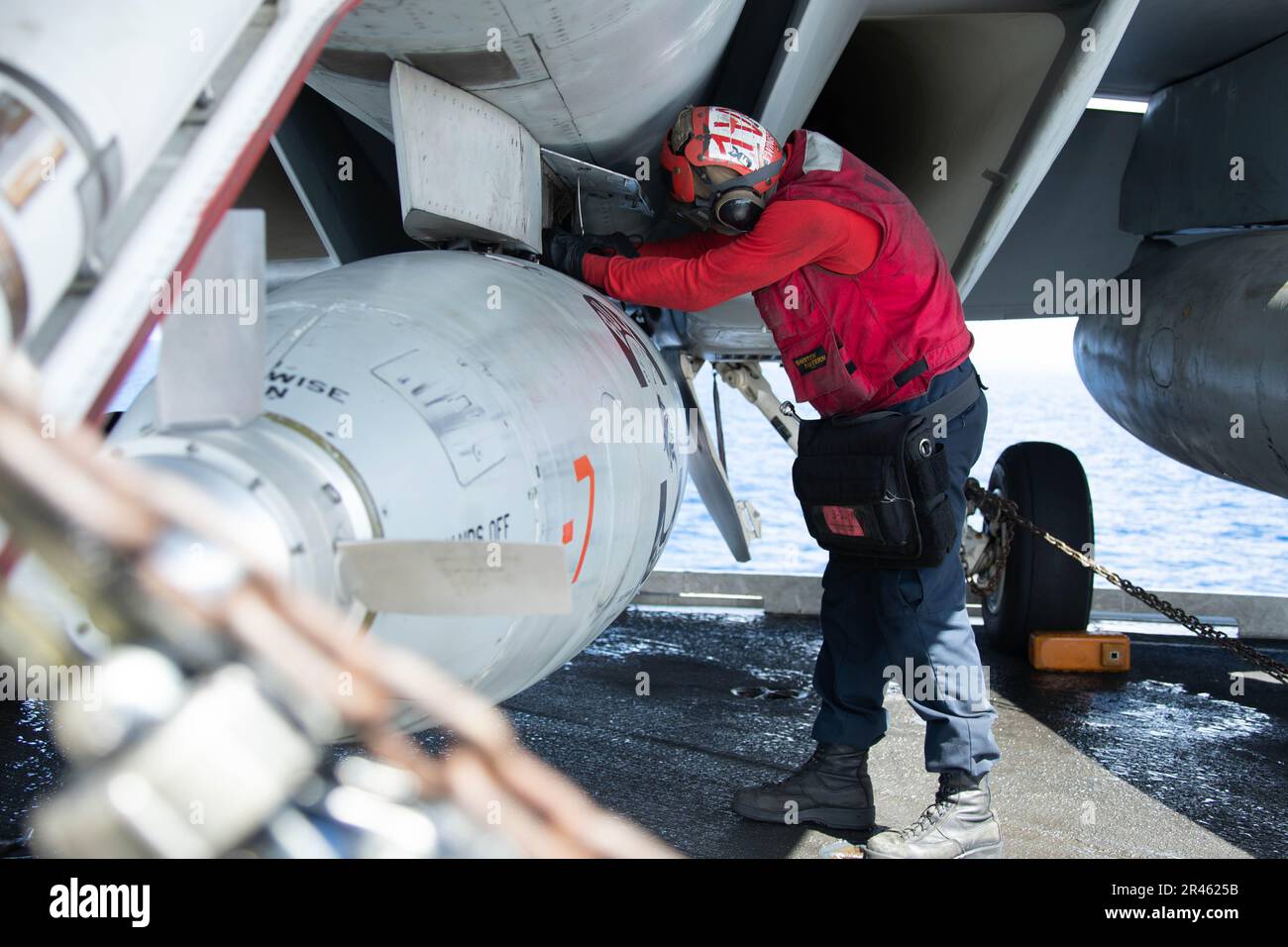 Aviation Ordnanceman 3rd Class Quinton Wingo, attached to the ÒRaginÕ ...