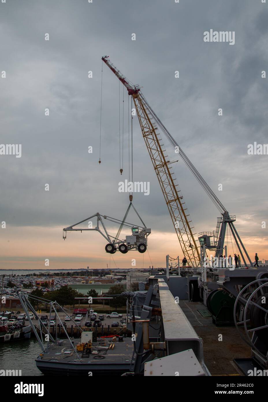 A crane lifts the first-in-class aircraft carrier USS Gerald R. Ford’s ...