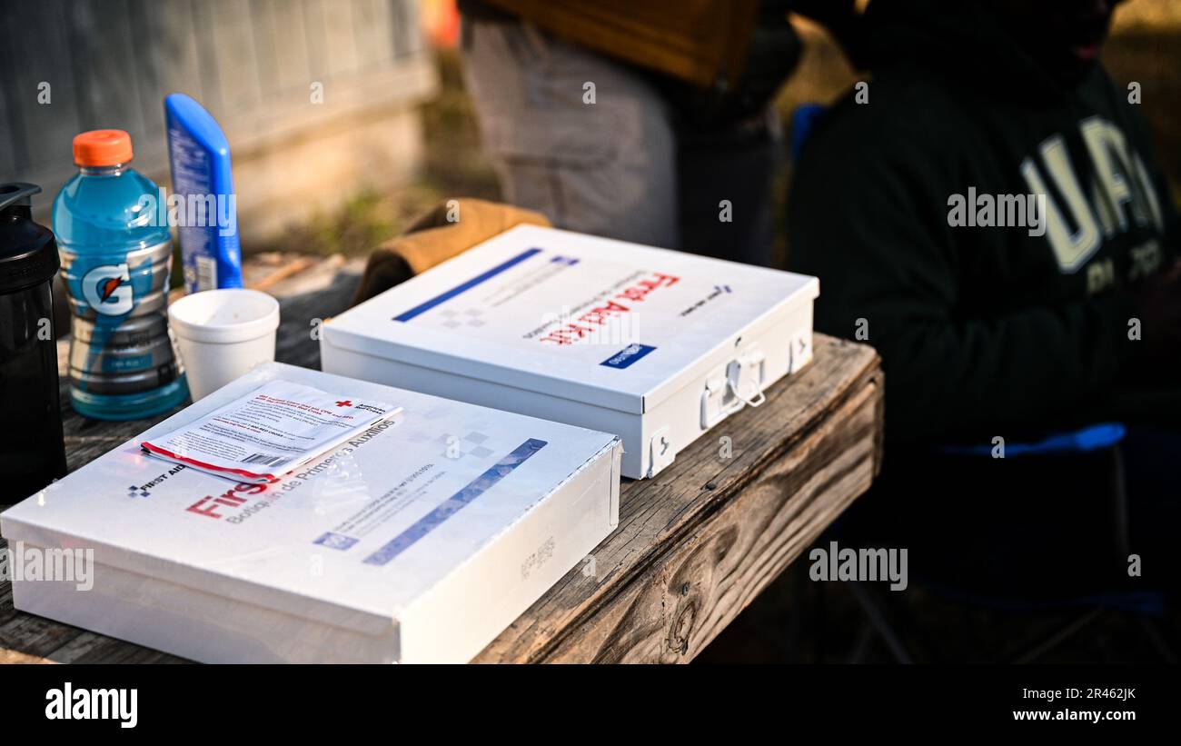 First aid kits sit on a table as part of a simulated clinic for combat ...