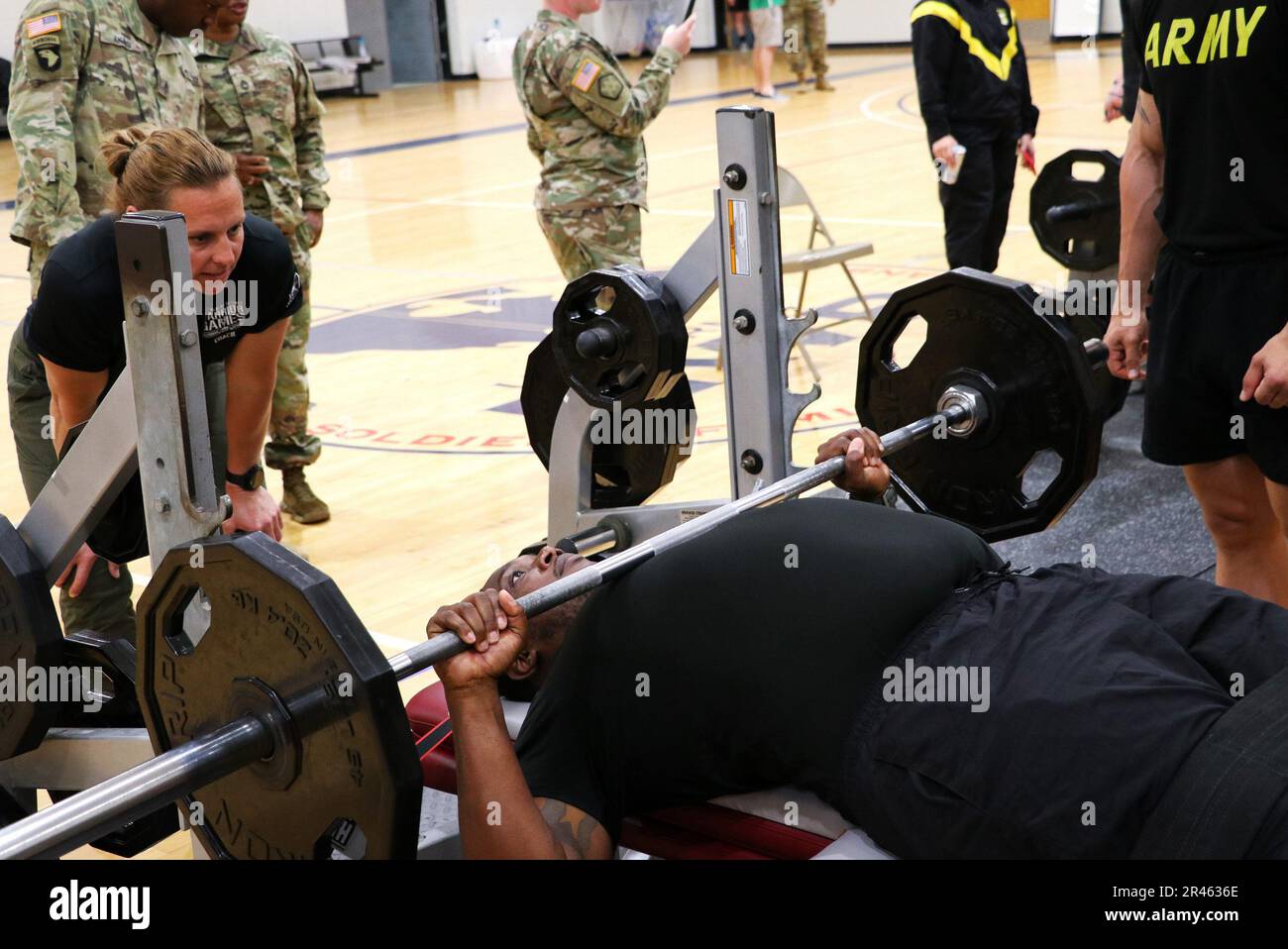 U.S. Army coach Adriane Wilson, left, looks on as Staff Sgt. Bill ...