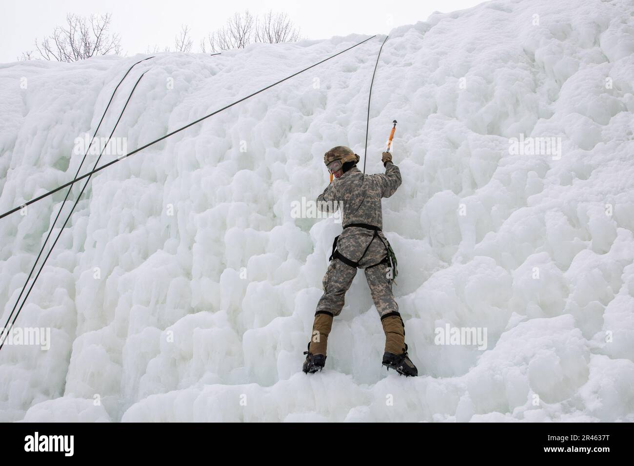 U.S. Army Soldier ice climbs during sustainment training conducted by ...