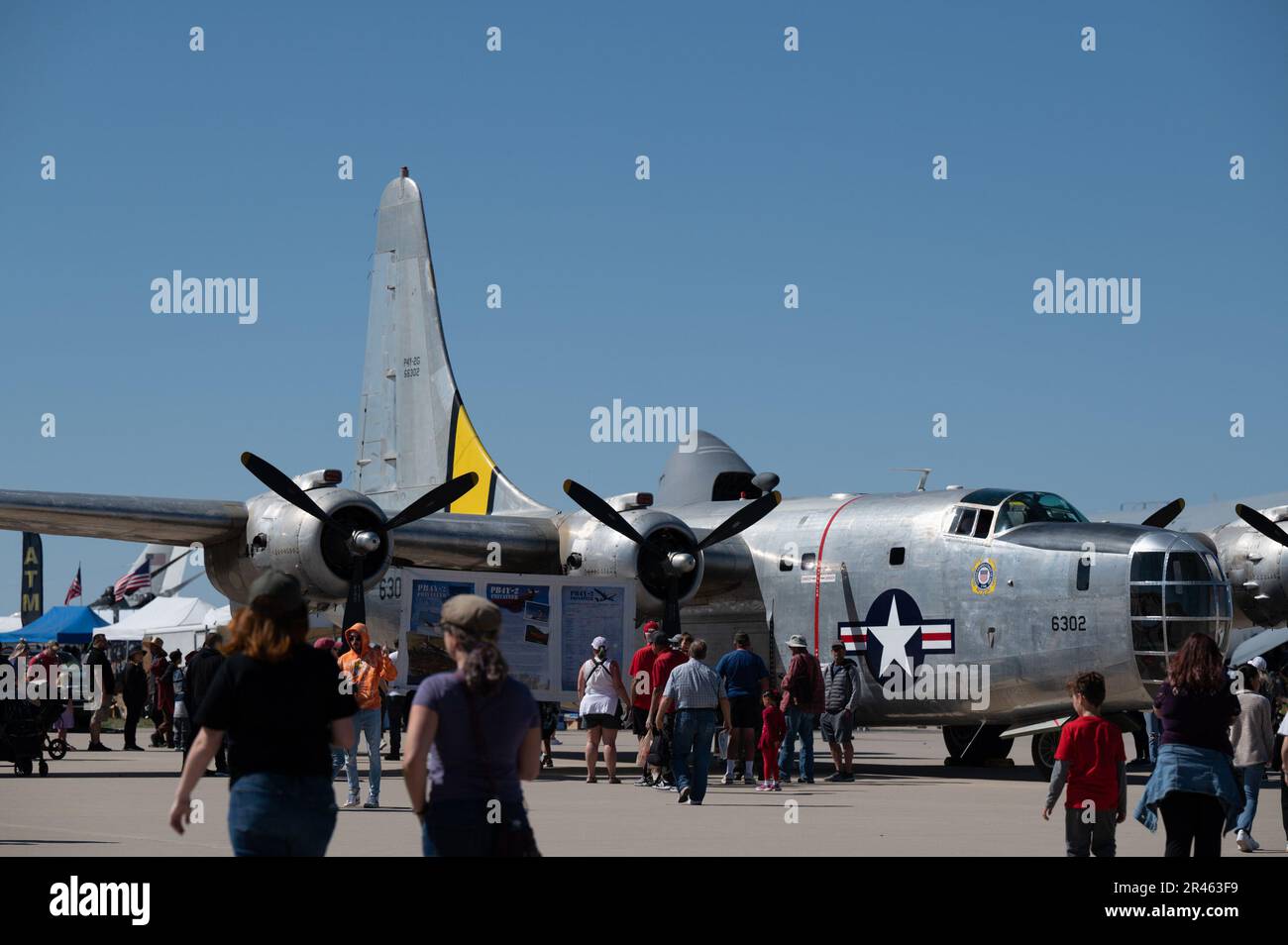 Air show attendees walk up and down the flight line during the Thunder ...