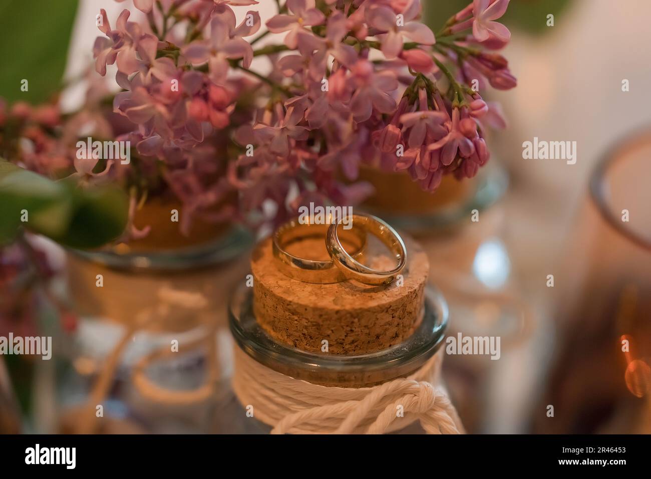 Wedding rings and flowers, wedding decor Stock Photo - Alamy