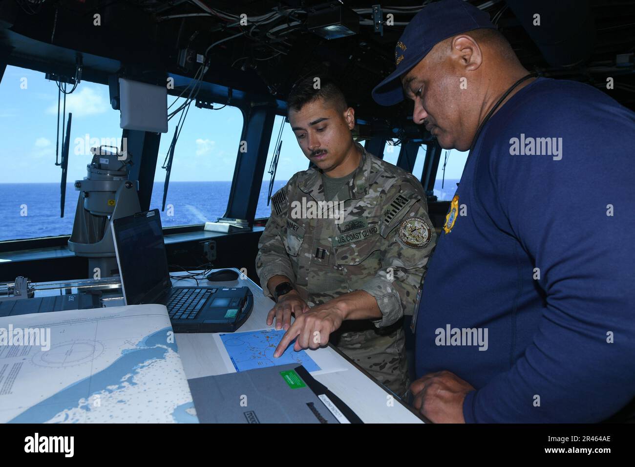 PACIFIC OCEAN (March 25, 2023) Coast Guardsman Lt. Kyle Swanney, left ...