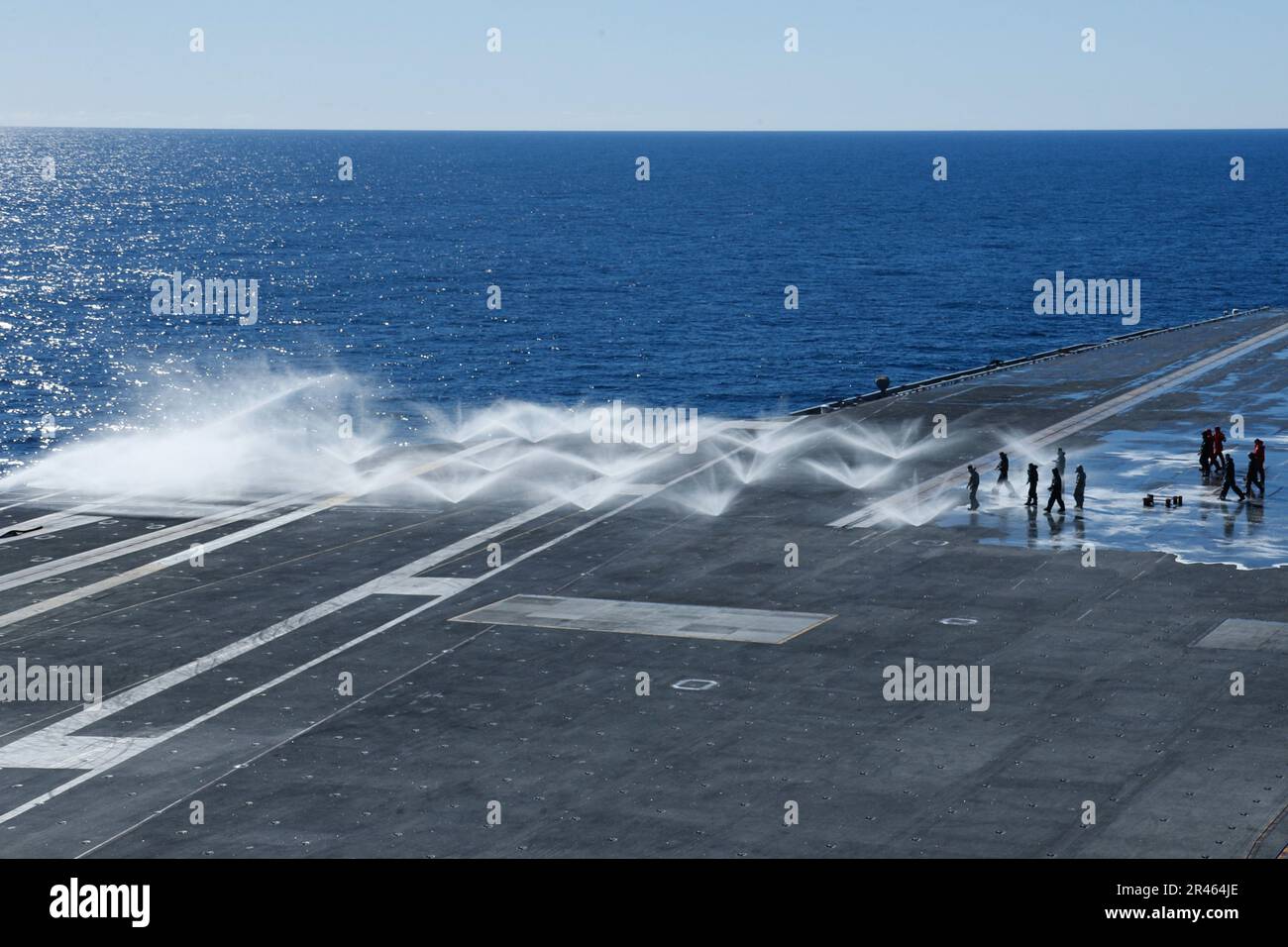 PACIFIC OCEAN (Jan 21, 2023) Sailors perform a countermeasure washdown ...
