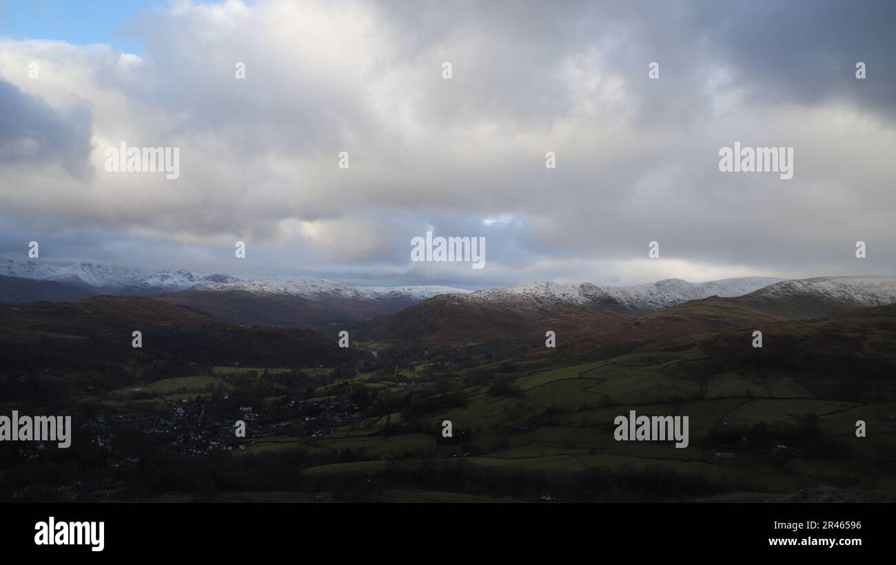 A scenic landscape of a tranquil mountainous valley in Windermere ...