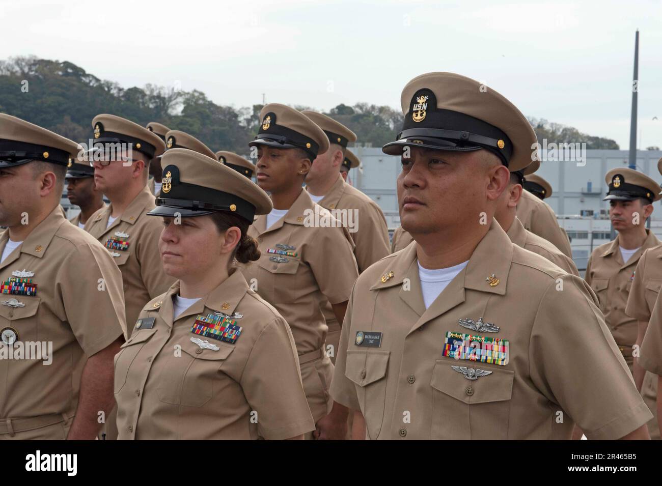 YOKOSUKA, Japan (May 26, 2022) - The official party salutes the colors ...