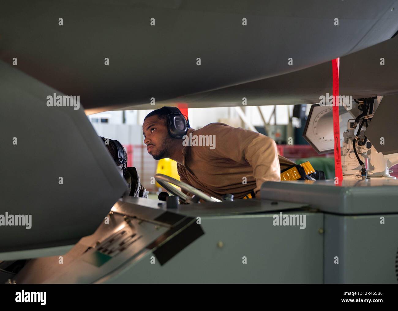 U.S. Air Force Senior Airman Avion Tucker, a weapons load crew member ...