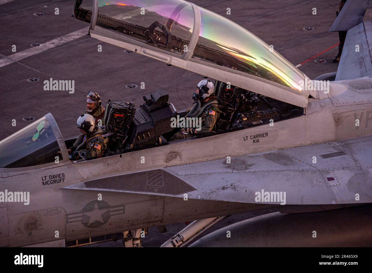 230331-N-JC256-1020 ATLANTIC OCEAN (Mar. 31, 2023) Pilots on an F/A-18E Super Hornet fighter jet ...