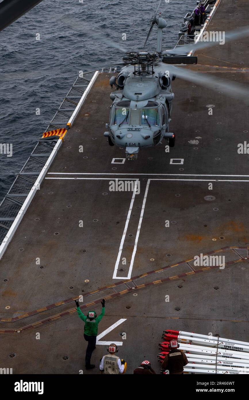 PACIFIC OCEAN (April 2, 2023) – An MH-60S Sea Hawk, assigned to the ...