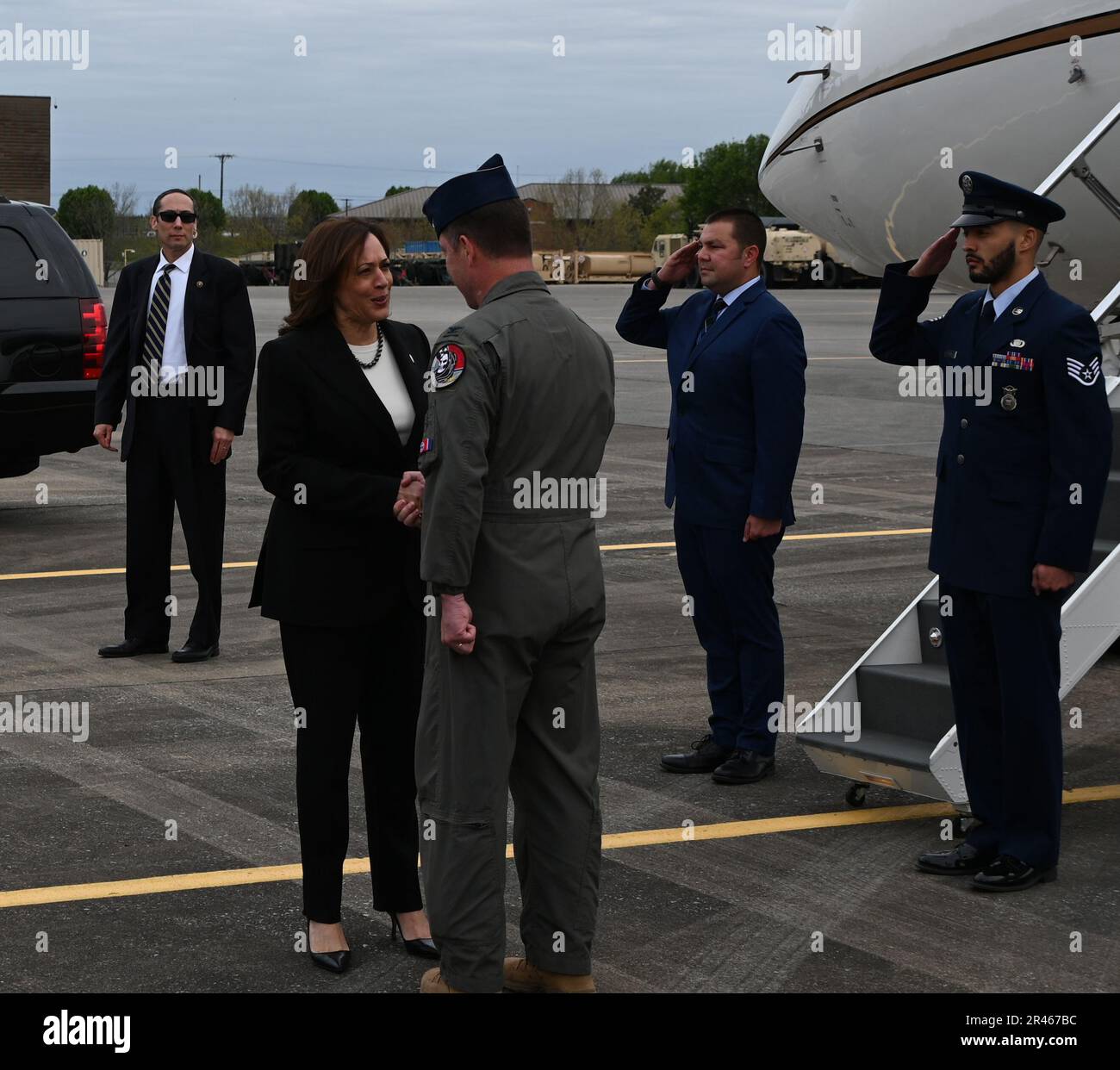 Vice President Kamala Harris greets Col. Ted Geasley, commander of the ...