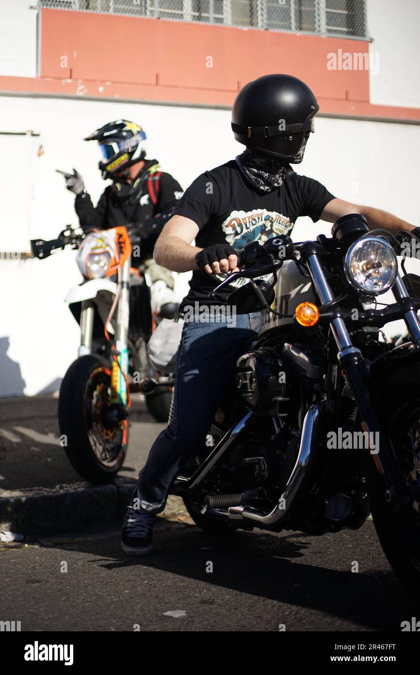 Bikers wearing helmets hi-res stock photography and images - Alamy