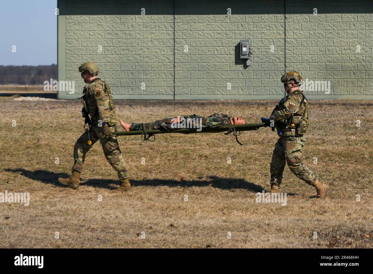 Members from the 114th Fighter Wing Security Forces Squadron carry a ...
