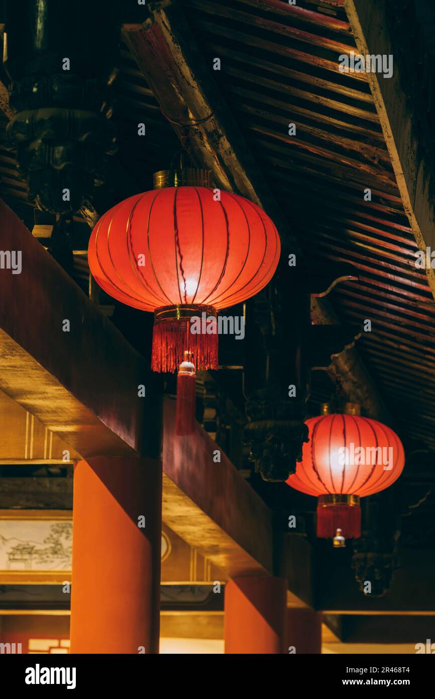 The two bright red lanterns under the eave in Liuzhou, Guangxi, China ...