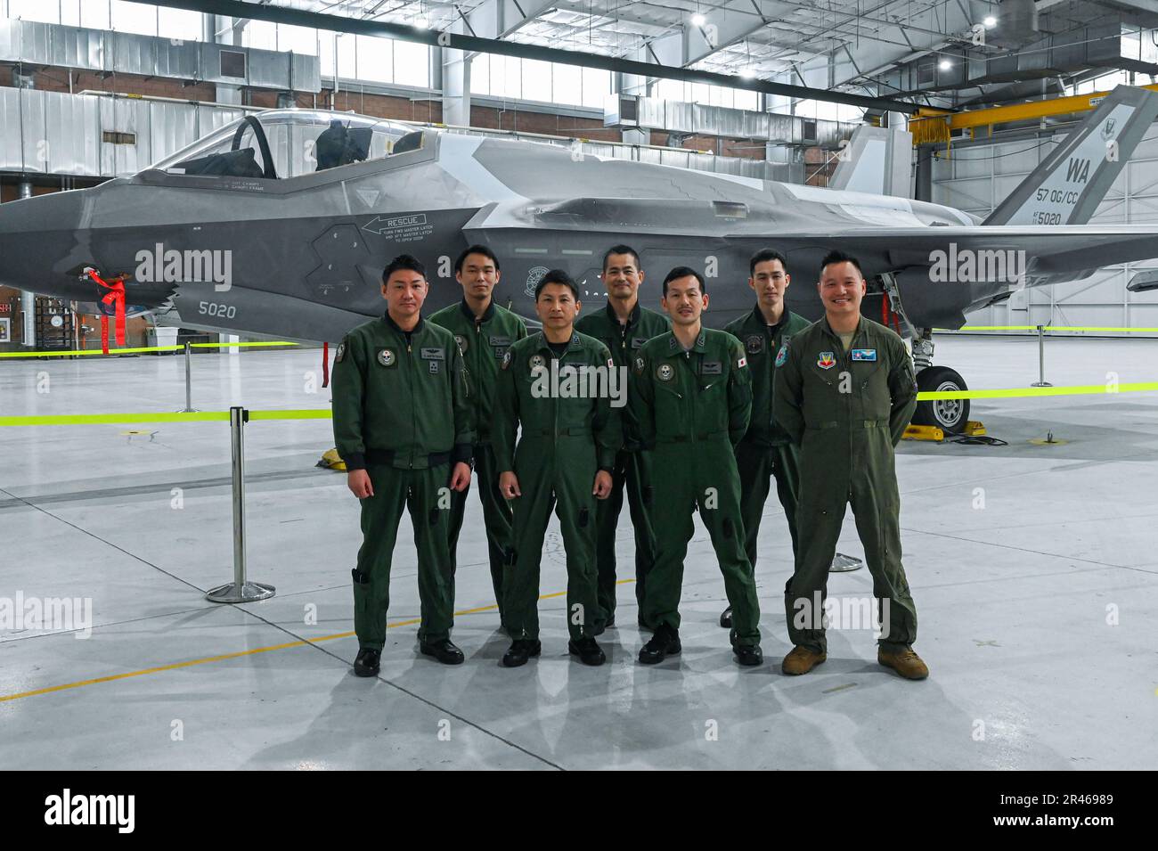 Members from the Japan Air Self-Defense Force stand in front of an F-35 ...