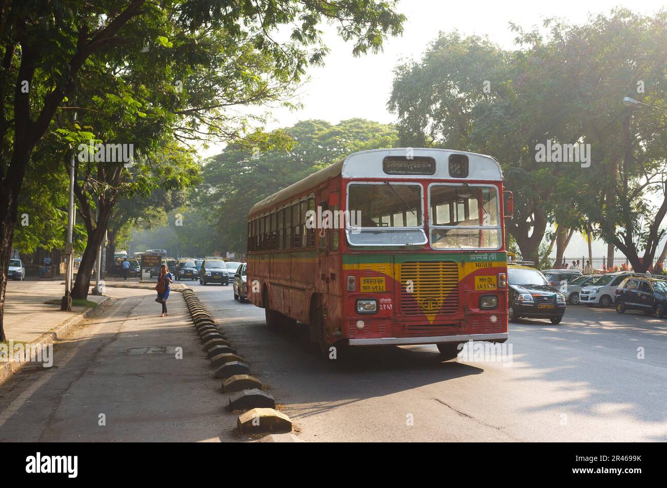 An old red bus on the road in Mumbai, India Stock Photo - Alamy