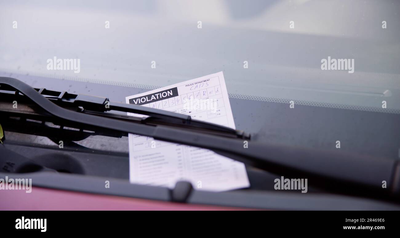 Parking Ticket Or Fine On Car Windshield Stock Photo - Alamy