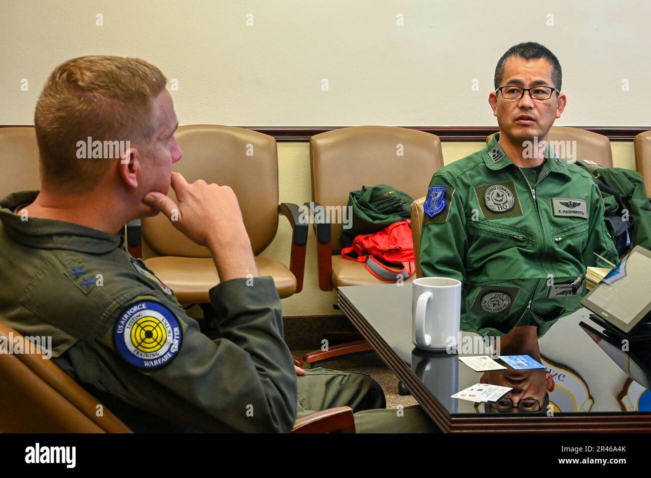U.S Air Force Major General Case Cunningham, left, listens to Japan Air ...