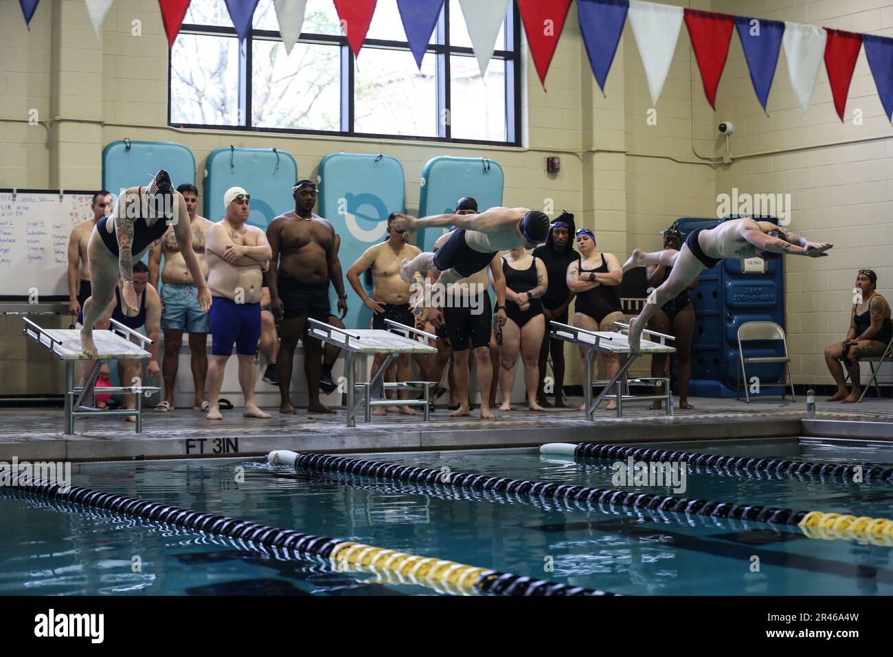 U.S. Army Athletes, diving into the pool during the U.S. Army Adaptive ...