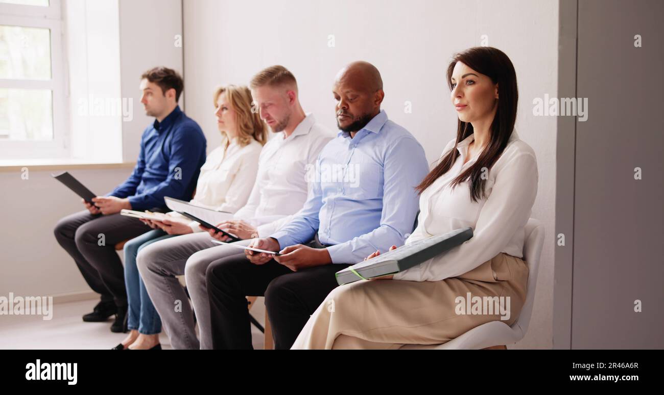 Young Woman Standing Up And Walking To Appointment Stock Photo - Alamy