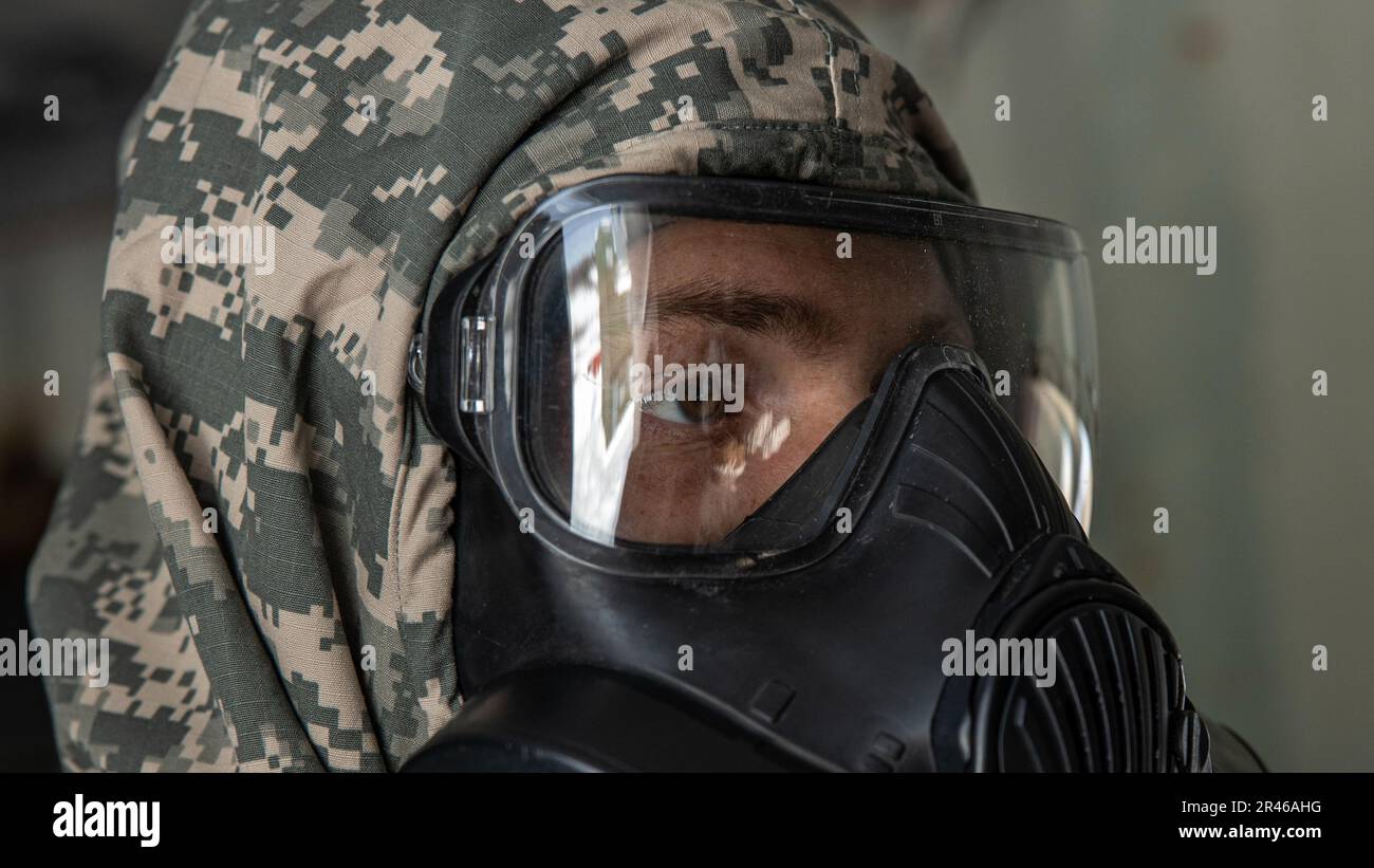 U.S. Marine Corps Cpl. Justin Dickison, a chemical, biological ...