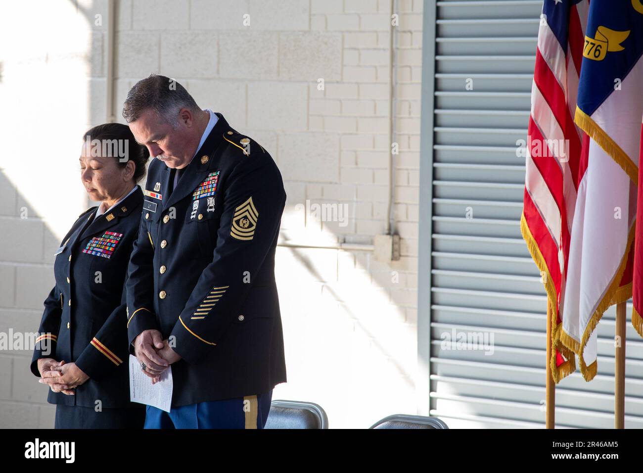 Command Sgt. Maj. Randy Ly, right, completes his last official duty for ...