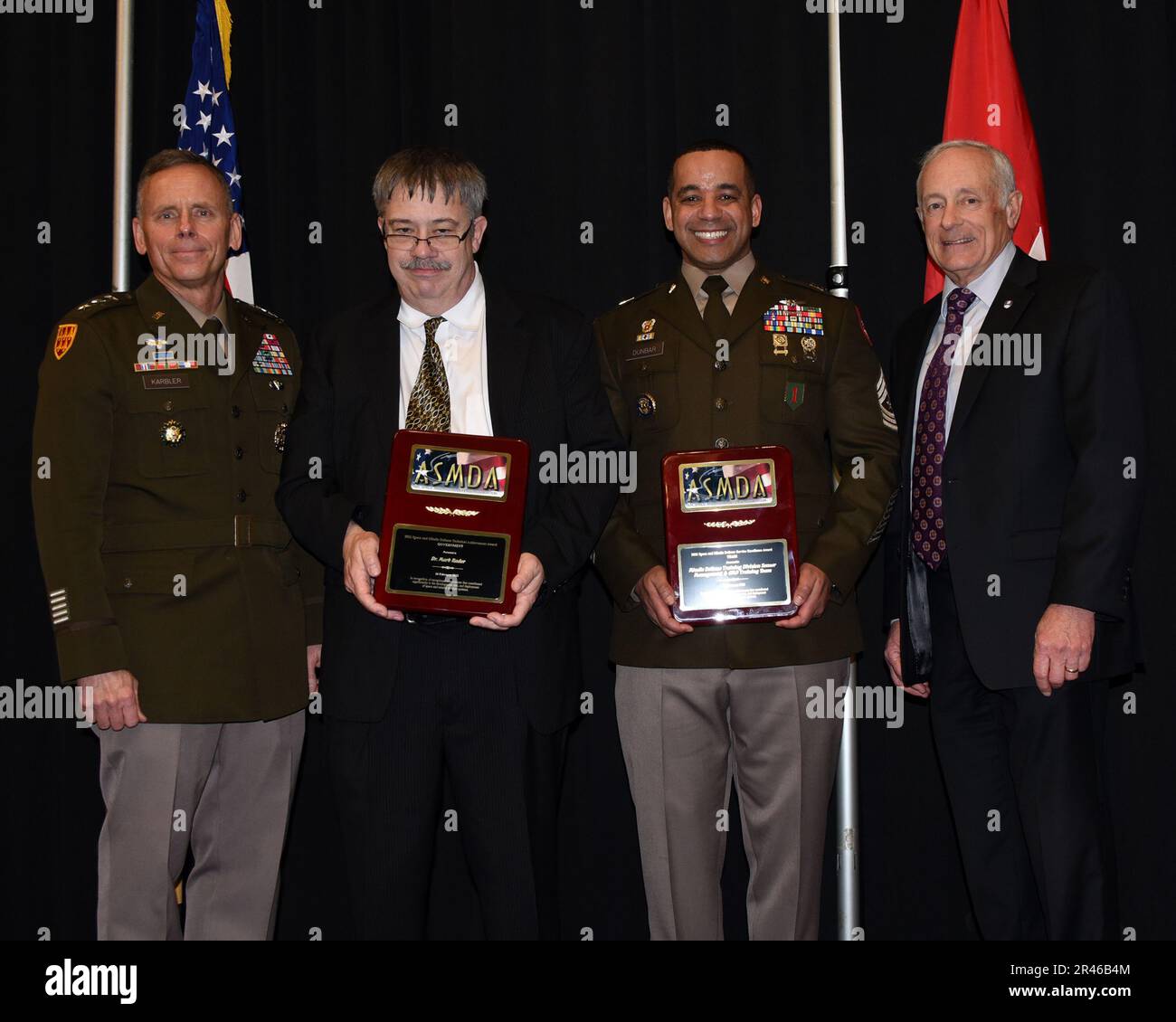 Lt. Gen. Daniel L. Karbler, left, commanding general of U.S. Army Space ...