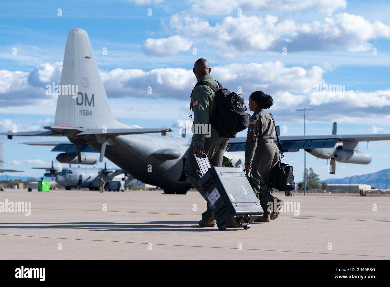 Aircrew from the 43rd Electronic Combat Squadron walk towards an EC ...