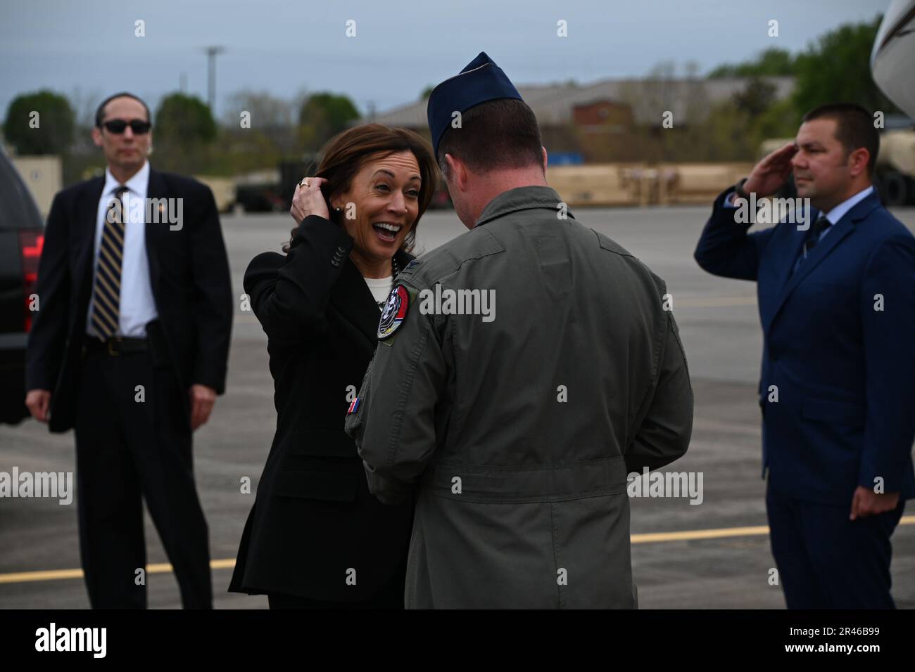 Vice President Kamala Harris greets Col. Ted Geasley, commander of the ...